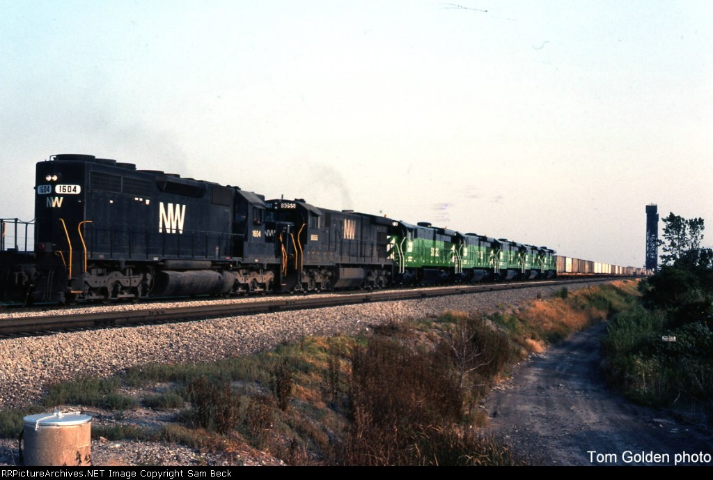 NW 1604 and 8055 with New BN C30-7s